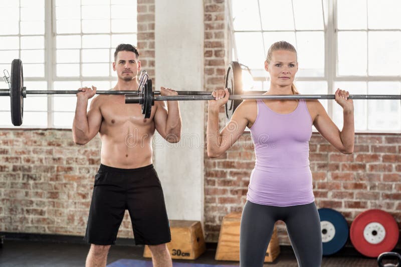 Two fit people working out stock image. Image of bodybuilding - 60539875
