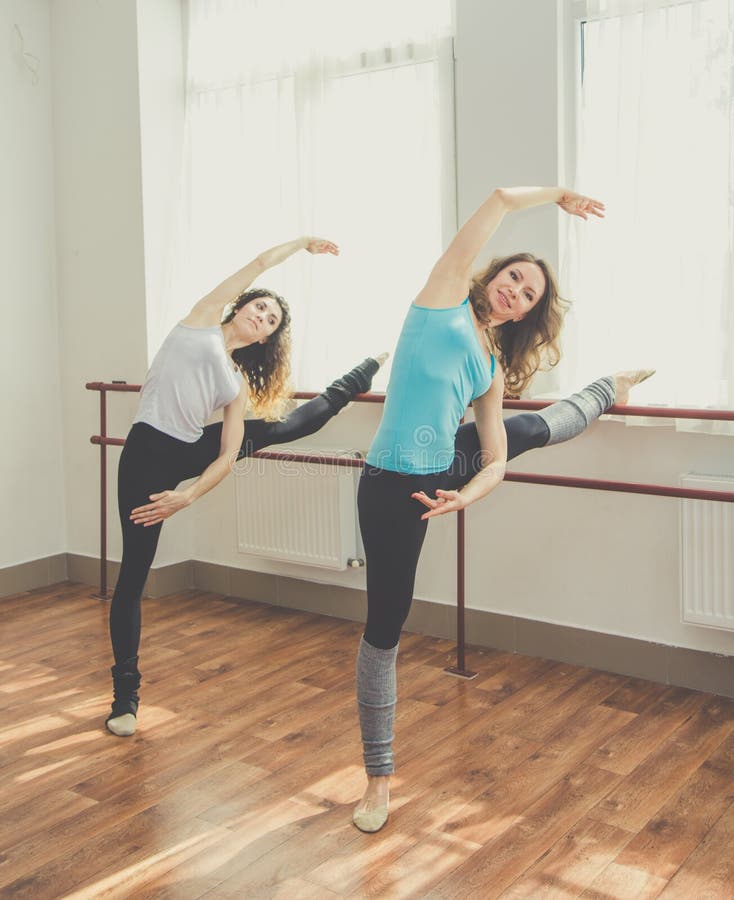 Two Fit Pretty Women are Doing Ballet Exercise Stock Photo - Image of ...