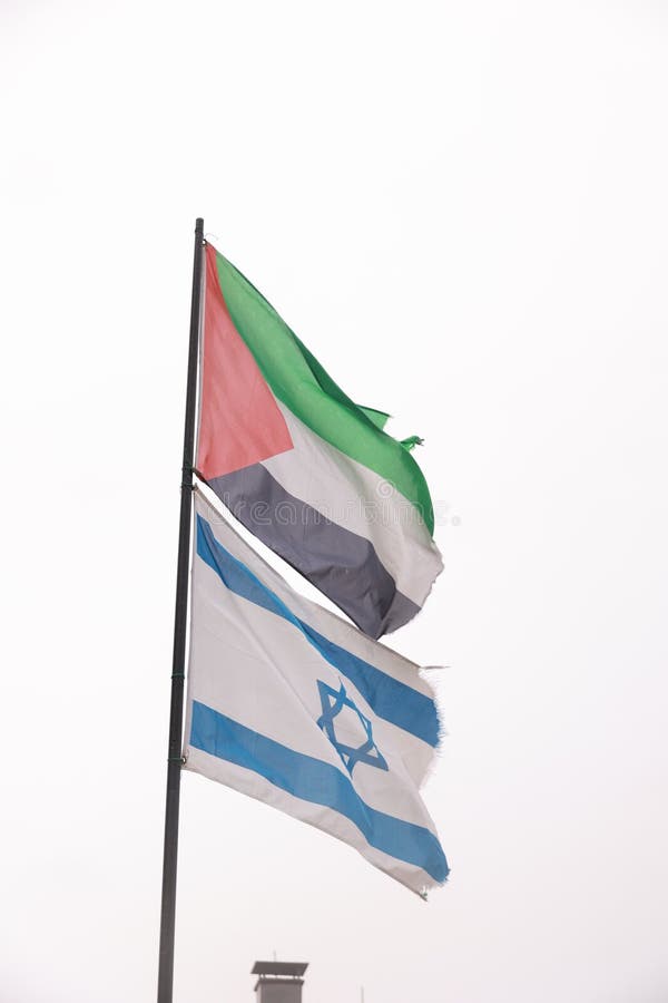 Two Flags are Flying Side by Side on a Pole Stock Image - Image of ...