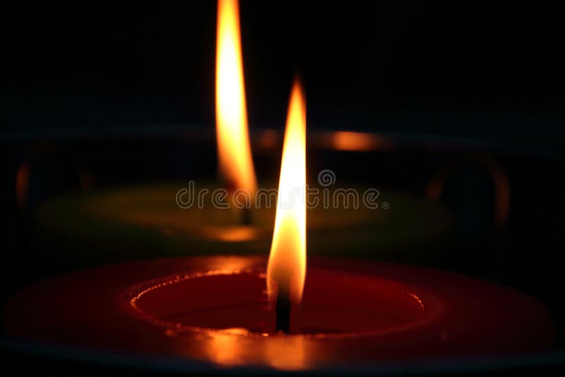 Two Flames from candles stock image. Image of candle - 130911599