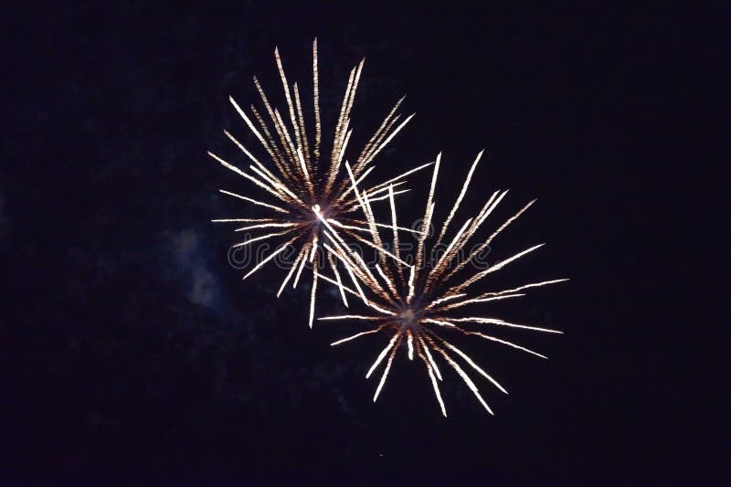 Two Flashes of an Inexpensive Fireworks Explosion Stock Photo - Image ...