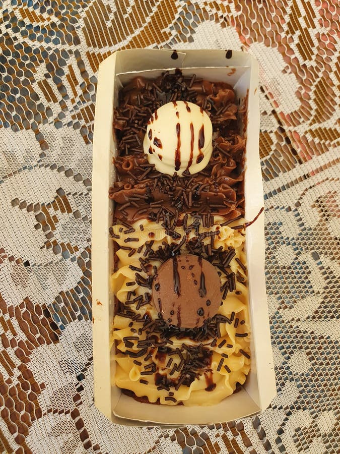 Two flavors cake stock photo. Image of food, cake, clothing - 213649798