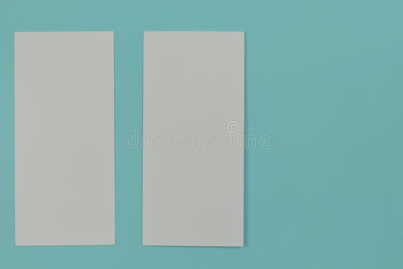 Two Folded Blank Paper Leaflet on Blue Background Stock Photo - Image ...