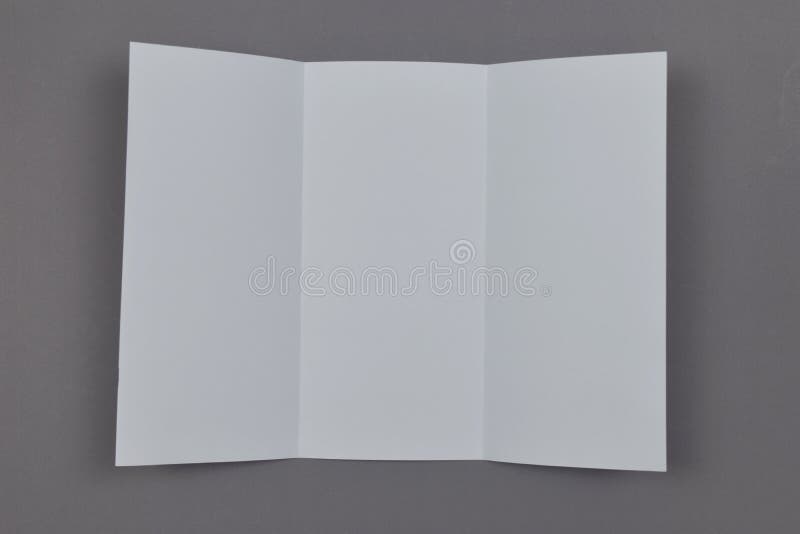 Two Folded Blank Paper Leaflet on Blue Background Stock Photo - Image ...