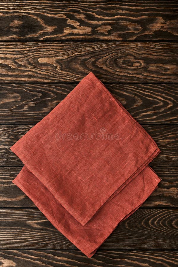 Two Folded Linen Napkins on a Wooden Table with Copy Space, Top View ...