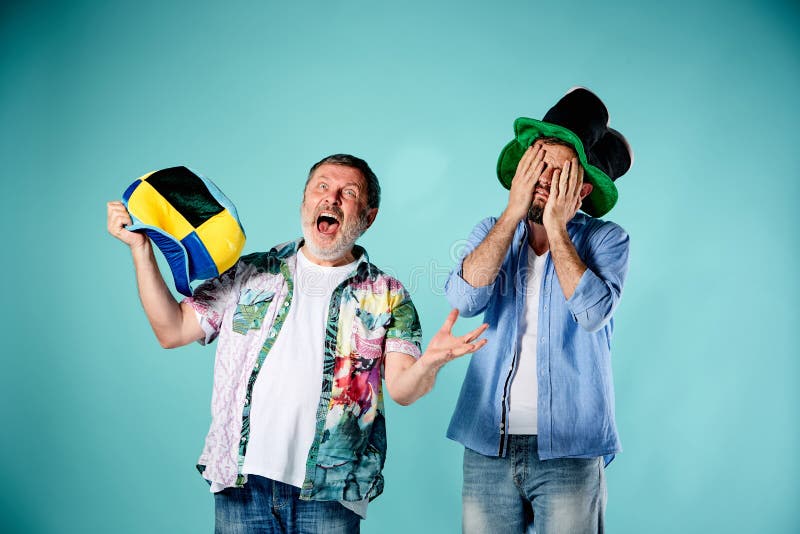 The Two Football Fans Over Blue Stock Photo - Image of event, person ...