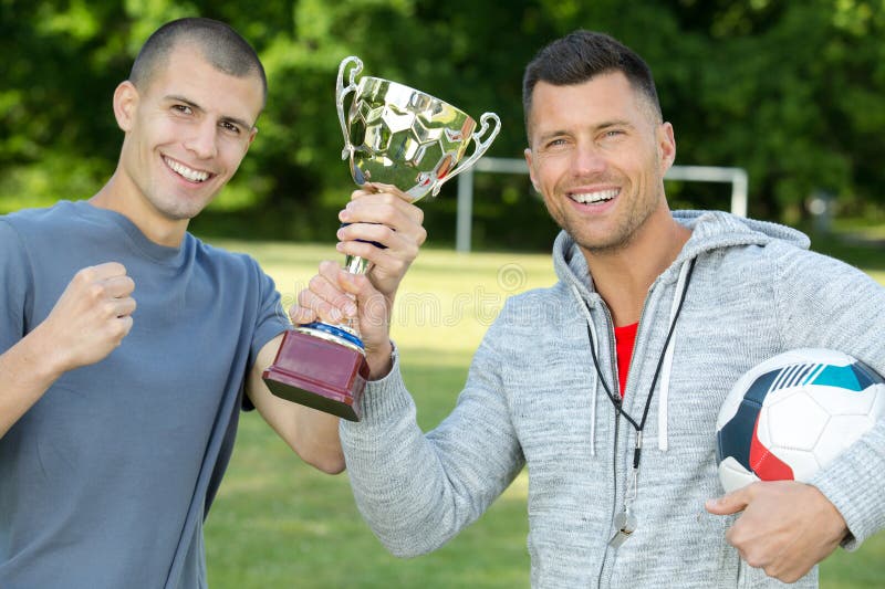 Two Football Players Celebrating Victory Stock Image - Image of soccer ...
