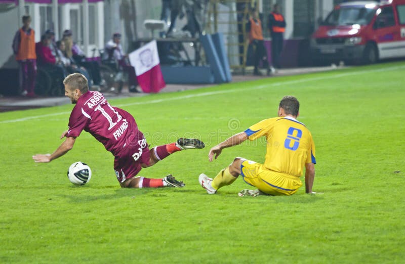 Two Football Players Fighting for the Ball Editorial Stock Photo ...