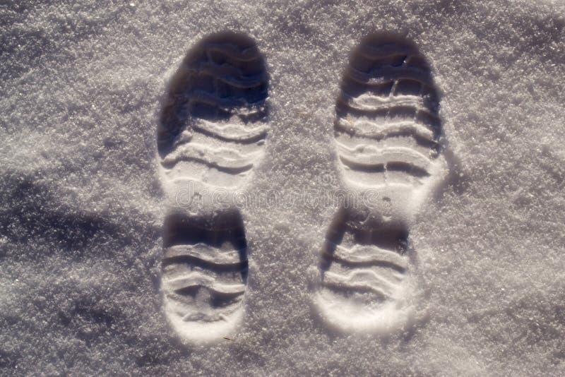 Two Footprints in Snow stock image. Image of path, human - 50176381