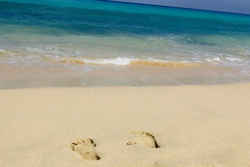 Two Footprints on Yellow Sand Stock Image - Image of sand, foot: 255945073