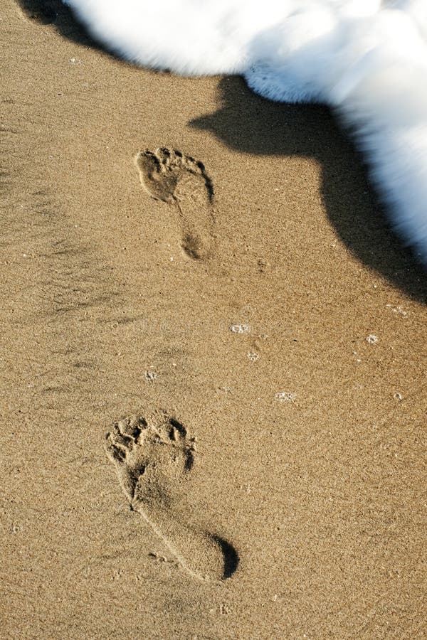 Foot Prints in the Sand stock image. Image of concept - 16308649