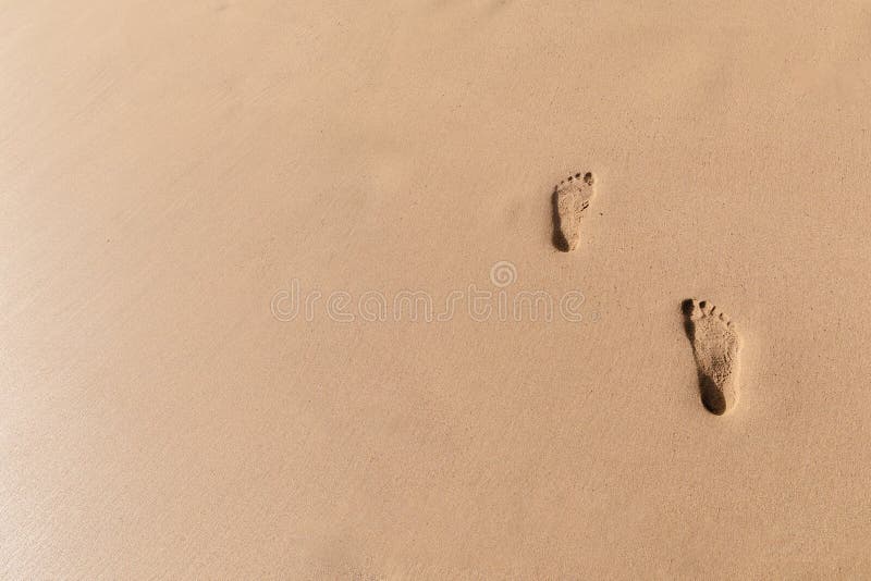 Two Footsteps in the Sand on a Walk in Maui Hawaii Stock Image - Image ...