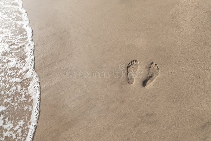 Two Footsteps in the Sand on a Walk in Maui Hawaii Stock Photo - Image ...