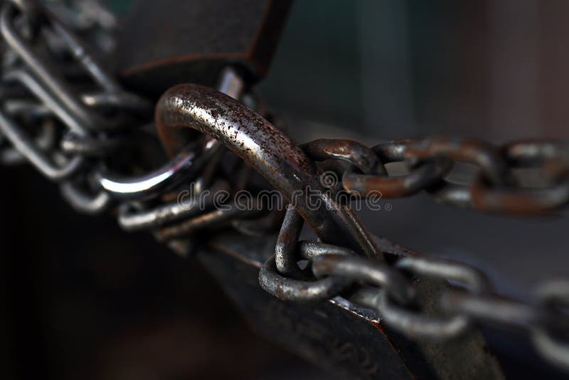Old Rusty Lock,connecting Two Chains.Two Forces Pulling in Different ...