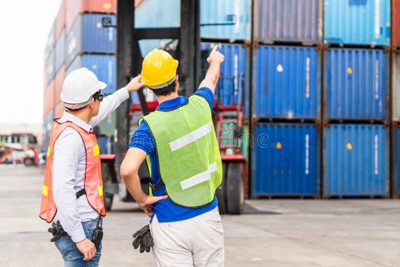 Foreman Point To Position Loading Containers Box from Cargo Freight ...