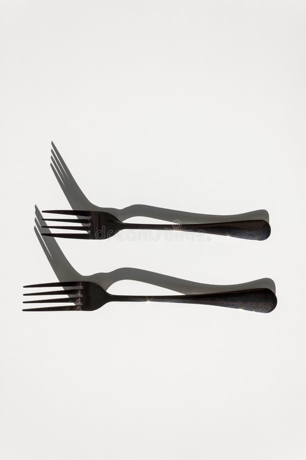 Forks and Shadows on White Background Stock Image - Image of breakfast ...