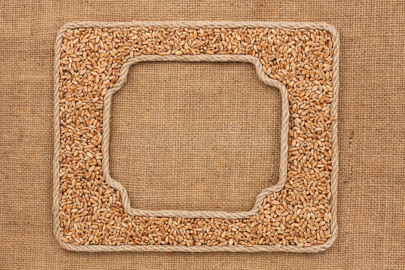 Two Frames Made of Rope with Wheat Grains on Sackcloth Stock Photo ...
