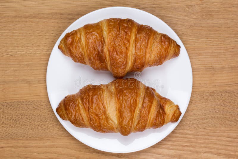 Two Delicious Croissants On A Plate Stock Image - Image of eating ...