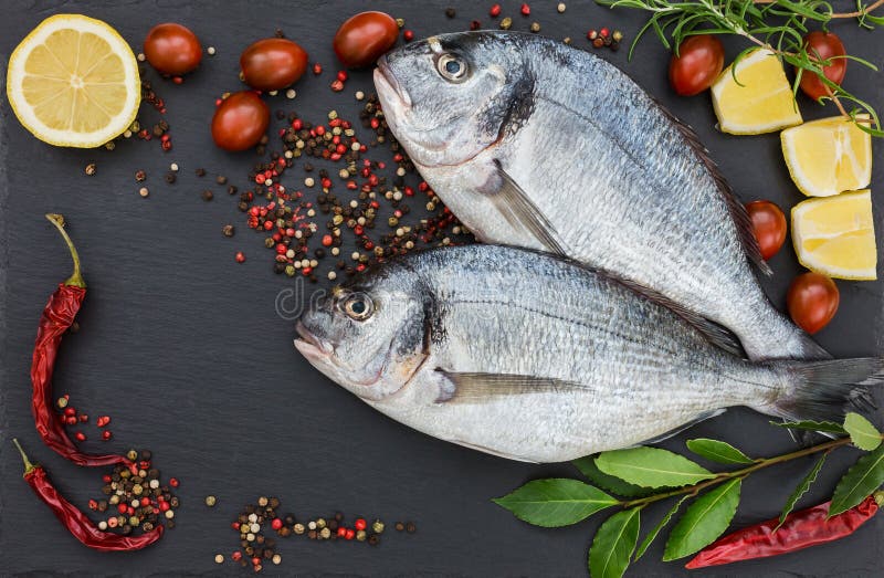 Two Fresh Dorado Fish on Slate Cutting Board. Top View Stock Image ...