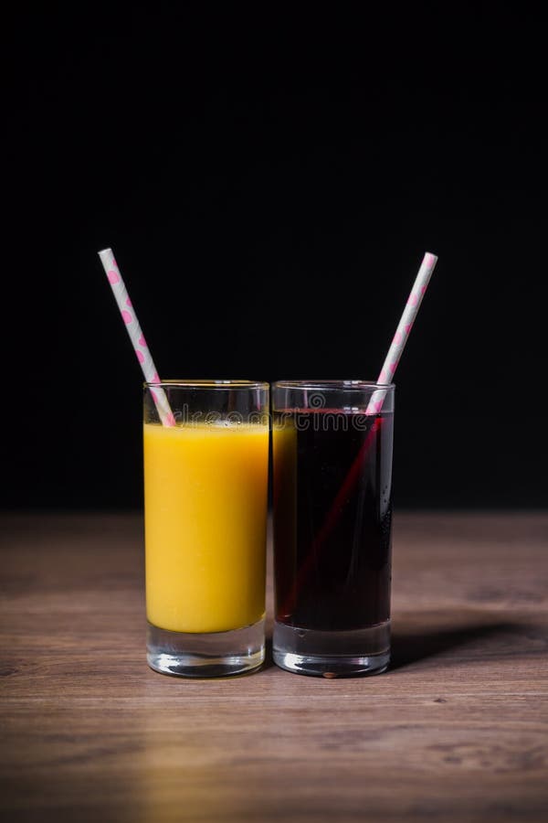 Two Fresh Glasses of Juice with a Straw Stock Image - Image of glass ...