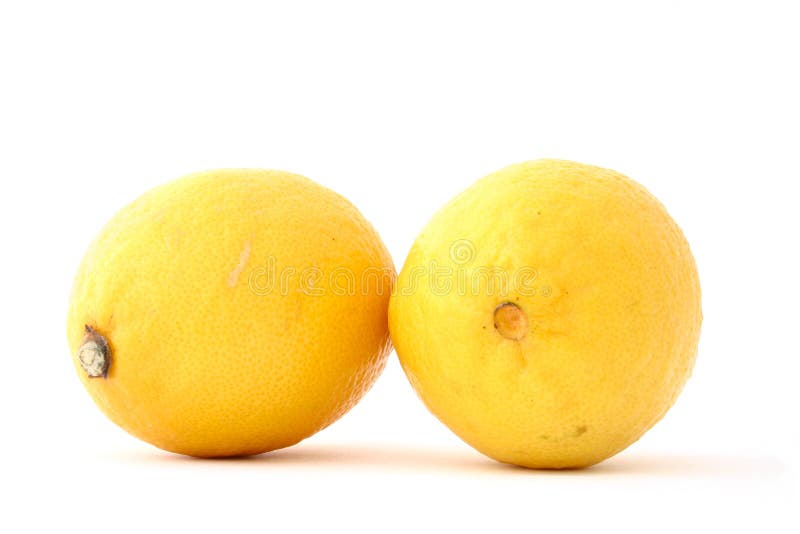Two fresh lemons on white stock image. Image of fresh, fruits - 430045