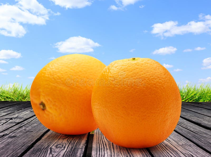 Two Fresh Oranges on Sky Background Stock Photo - Image of juicy ...