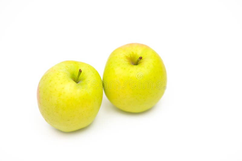 Two fresh yellow apples. stock image. Image of cookie - 191736697