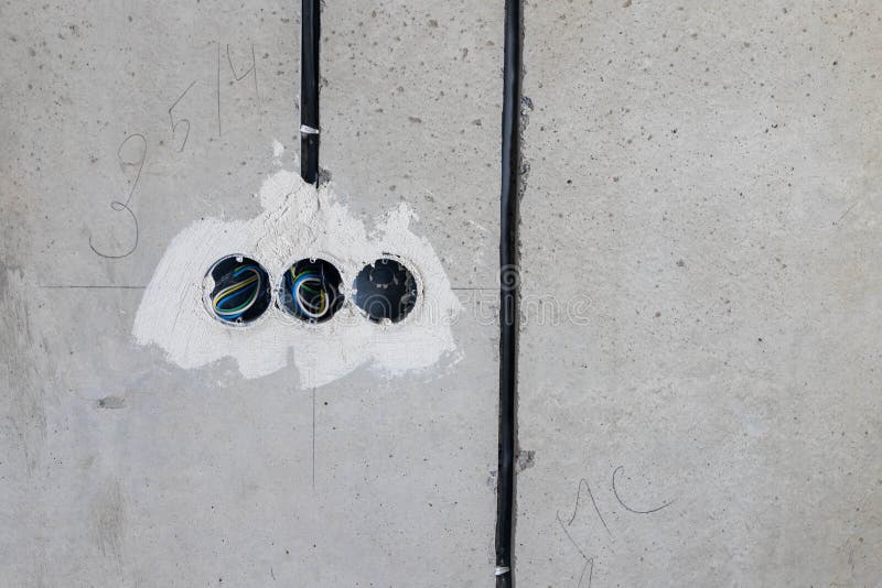 Two Freshly Drilled Wall Openings for Electrical Socket Boxes Aligned ...
