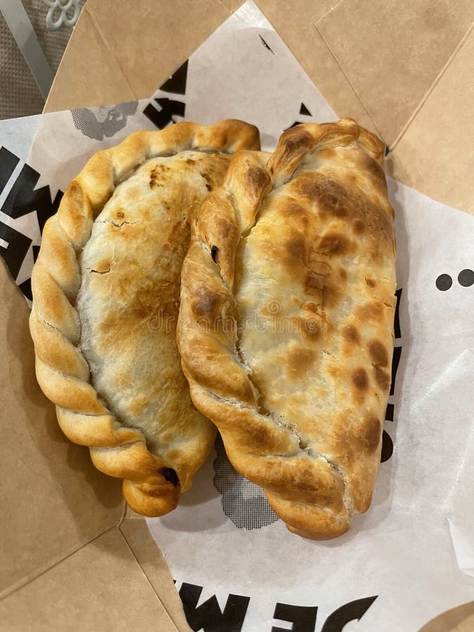 Two fried pies on a paper stock photo. Image of homemade - 364819316
