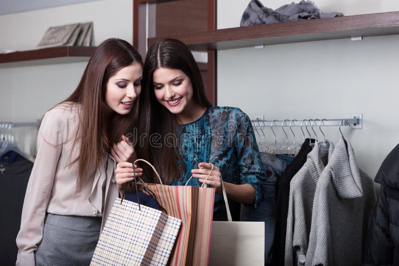Two Friends Buy Presents in a Sale Stock Photo - Image of friends ...