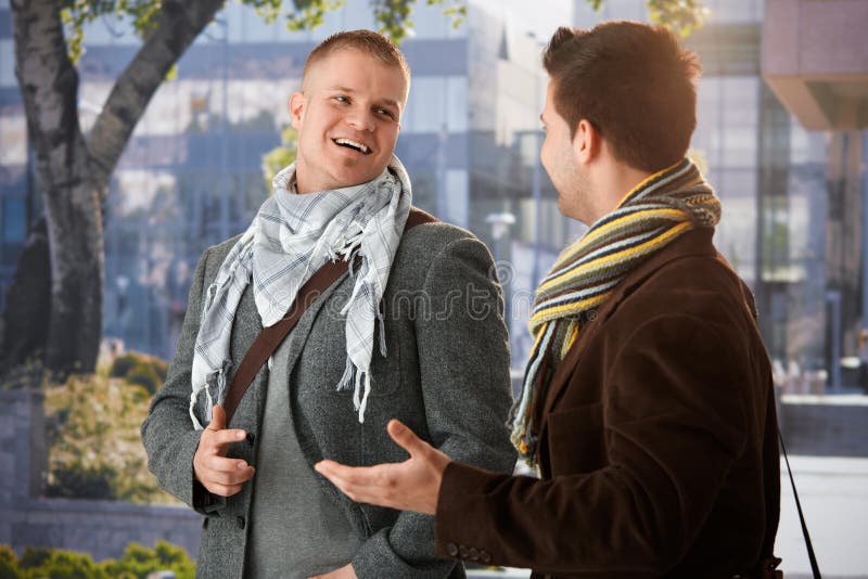 Two Friends Chatting Outdoors Stock Photo - Image of hand, good: 21229404
