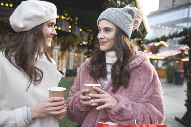Two Friends on a Christmas Market Drinking Mulled Wine Stock Photo ...