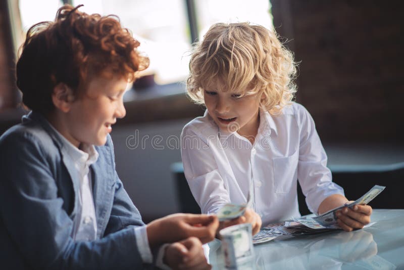 Two Friends Counting Saved Money and Looking Excited Stock Image ...