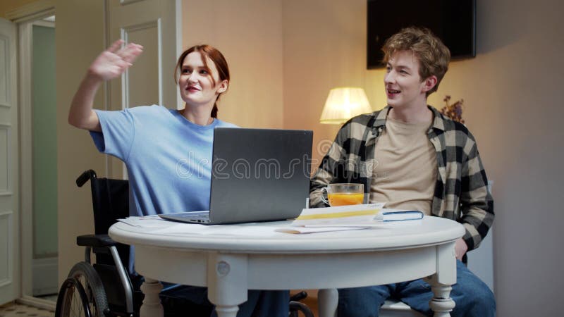 Two Friends are Discussing and Watching Something on the Computer ...