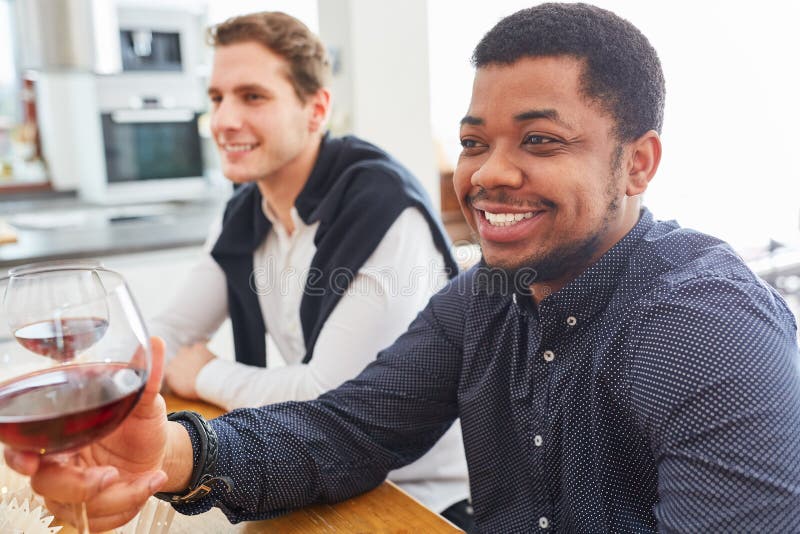 Two Friends Drinking Wine Together in Kitchen Stock Image - Image of ...