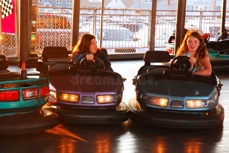 Two Friends Enjoy a Bumper Car Ride Editorial Photography - Image of ...