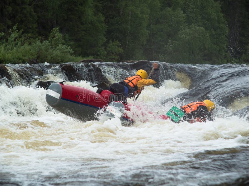 Two Friends on an Inflatable Catamaran Ride on the Rough River Stock ...