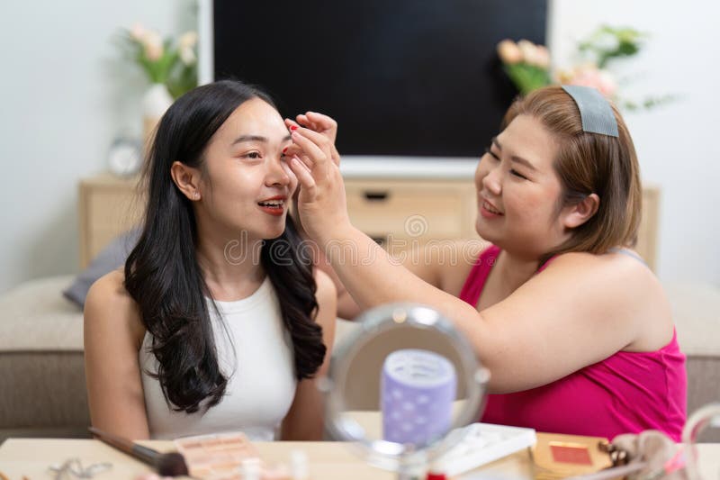Makeup and Creativity. Friends Applying Makeup, Celebrating Their ...