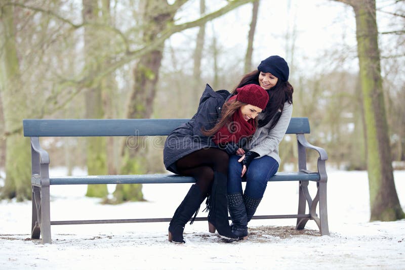 Two Friends at the Park Sharing a Good Laugh Stock Image - Image of ...