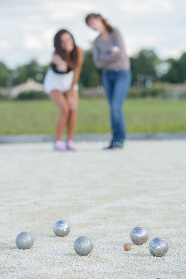 Two Friends Play Petanque Outdoors Out Focus Stock Image - Image of ...