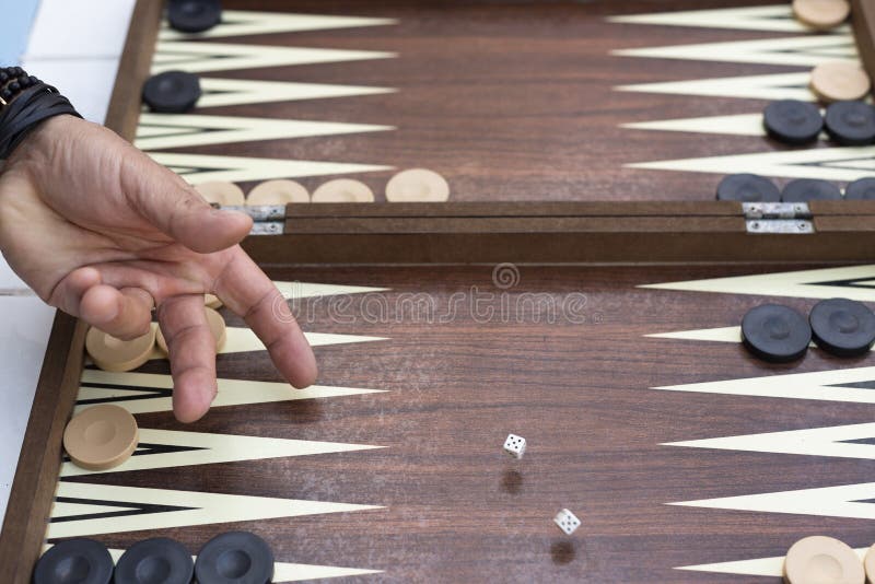 Two Friends Playing Backgammon at Home Stock Photo - Image of people ...