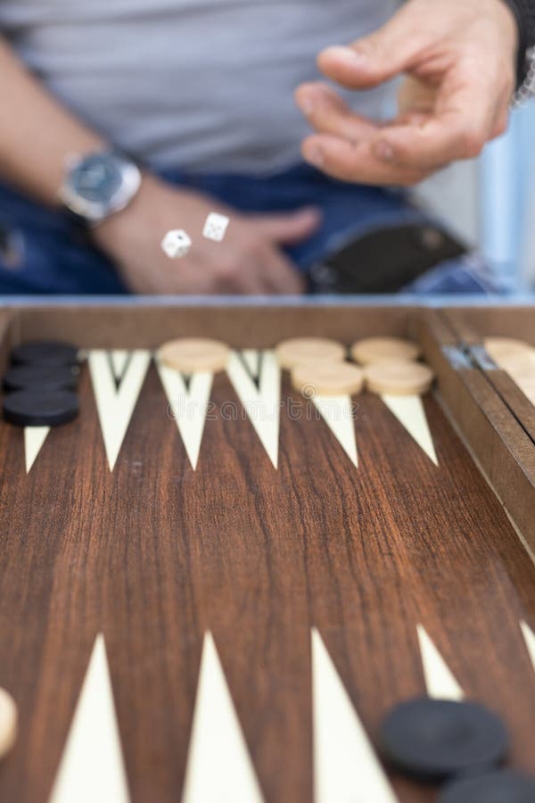 Two Friends Playing Backgammon at Home Stock Photo - Image of dice ...