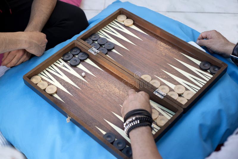 Two Friends Playing Backgammon at Home Stock Photo - Image of checker ...