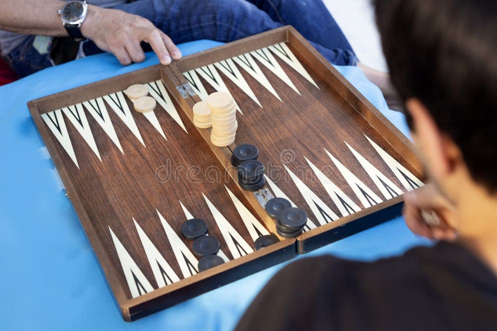 Two Friends Playing Backgammon at Home Stock Image - Image of blots ...