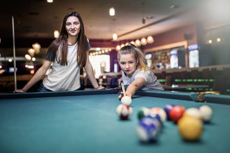 Two Friends Playing Billiard in Pub. Gambling Concept Stock Image ...