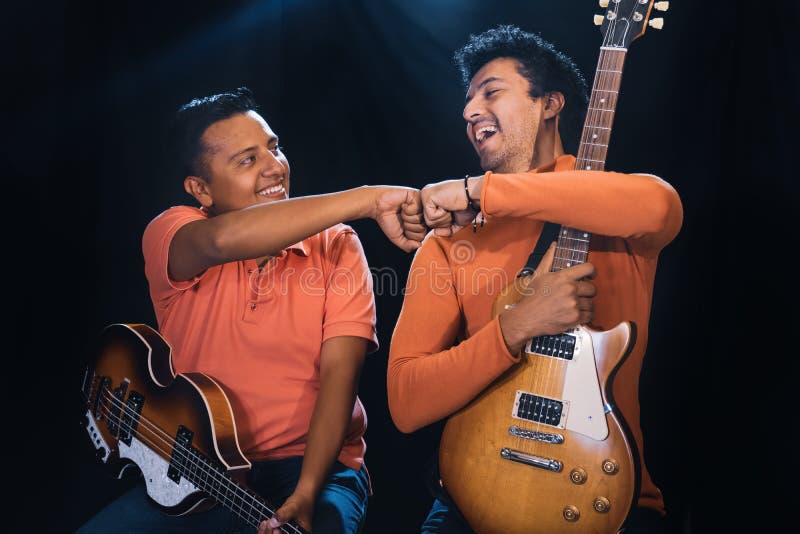 Two Friends Playing Guitar in Studio Stock Photo - Image of friendship ...