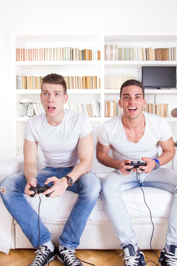 Two Friends Playing Video Games Stock Image - Image of activity ...