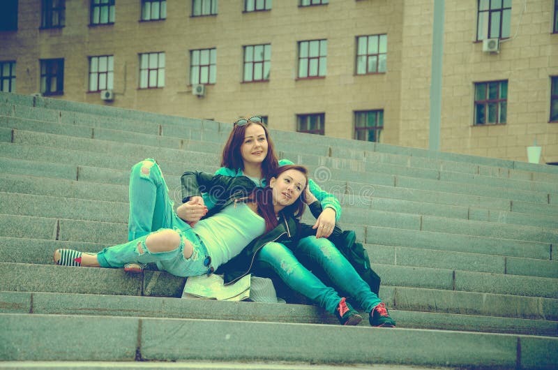 Two Friends are Resting on the Steps Stock Photo - Image of hand ...