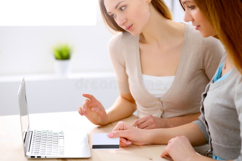 Two Friends or Sisters Talking Taking a Conversation at the Table with ...