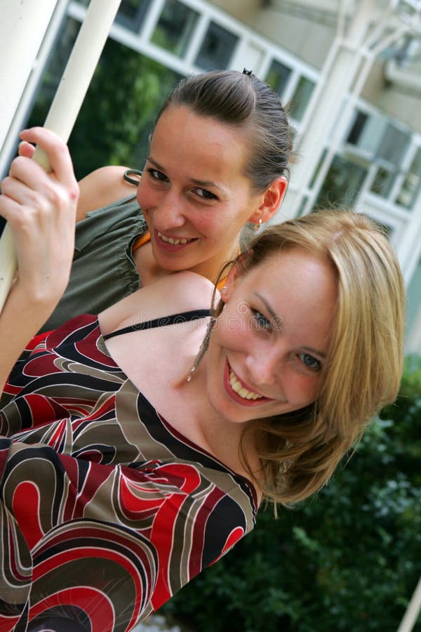 Two friends smiling stock image. Image of face, posing - 994909